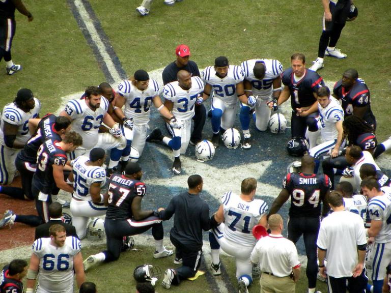 The History Of NFL After-Game Prayer Circles | Brad Vaughn